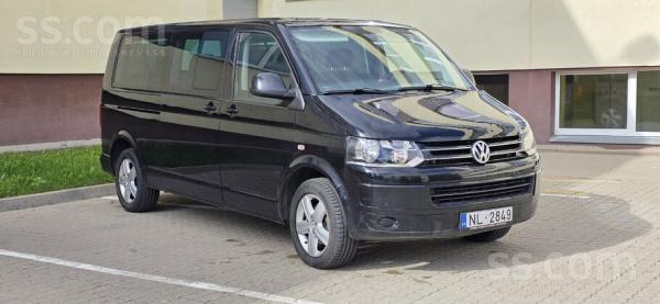 Black Volkswagen Caravelle 2012 in Riga, with an engine capacity of 2.00 L and mileage of 40 thousand km for 8950 €, photo 5 on AUTOMOTO.COM.LV