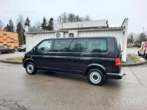 Black Volkswagen Caravelle 2013 in Riga, with an engine capacity of 2.00 L and mileage of 262 thousand km for 13900 €, photo  on AUTOMOTO.COM.LV