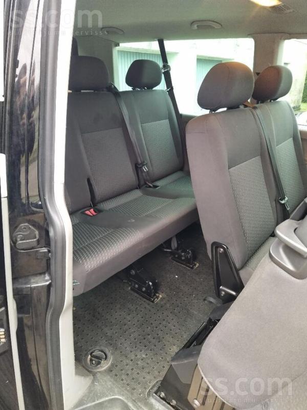 Black Volkswagen Caravelle 2013 in Riga, with an engine capacity of 2.00 L and mileage of 262 thousand km for 13900 €, photo 4 on AUTOMOTO.COM.LV