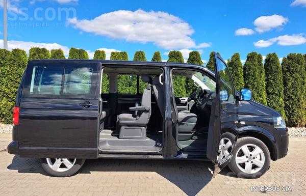 Black Volkswagen Caravelle 2015 in Riga, with an engine capacity of 2.00 L and mileage of 0 thousand km for 21659 €, photo 10 on AUTOMOTO.COM.LV