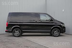 Melns Volkswagen Caravelle 2016 Ogre, ar dzinēja tilpumu 2.00 L un nobraukumu 151 tūkst. km par 19900 €, foto 7 vietnē AUTOMOTO.COM.LV