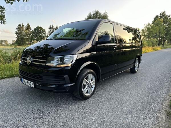 Black Volkswagen Caravelle 2016 in Bauska, with an engine capacity of 2.00 L and mileage of 225 thousand km for 18500 €, photo 1 on AUTOMOTO.COM.LV