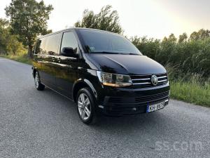 Black Volkswagen Caravelle 2016 in Bauska, with an engine capacity of 2.00 L and mileage of 225 thousand km for 18500 €, photo 3 on AUTOMOTO.COM.LV