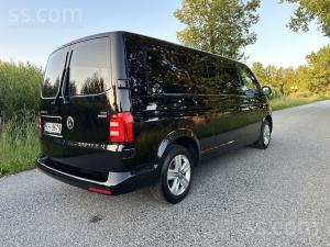 Black Volkswagen Caravelle 2016 in Bauska, with an engine capacity of 2.00 L and mileage of 225 thousand km for 18500 €, photo 4 on AUTOMOTO.COM.LV
