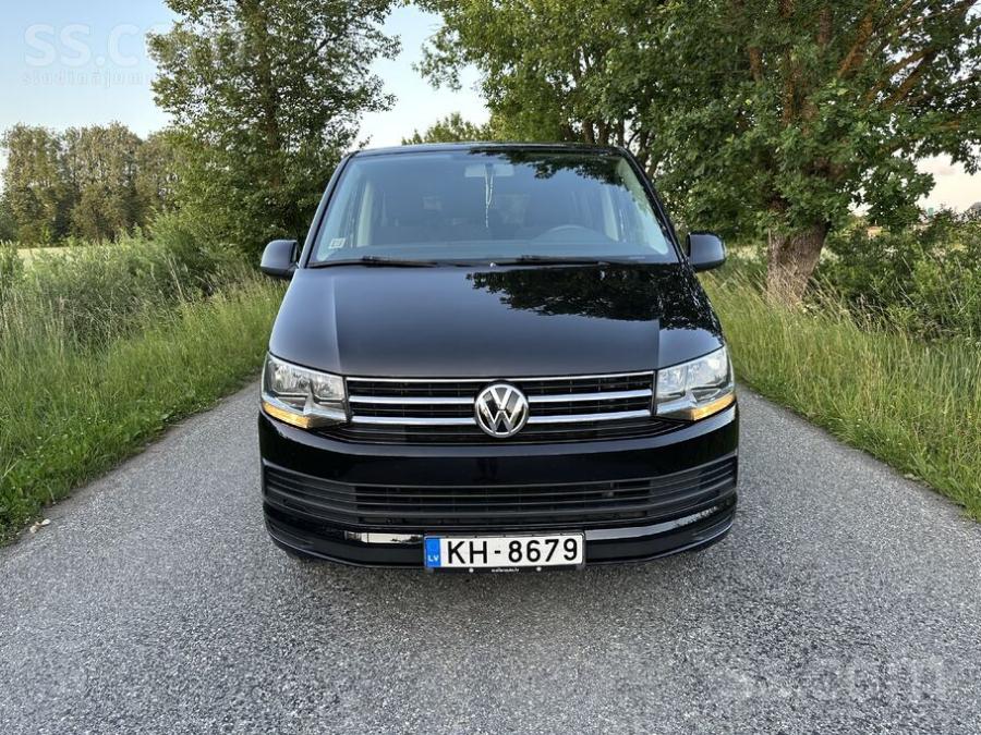 Black Volkswagen Caravelle 2016 in Bauska, with an engine capacity of 2.00 L and mileage of 225 thousand km for 18500 €, photo 6 on AUTOMOTO.COM.LV