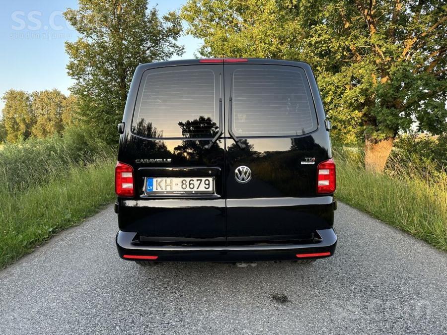 Black Volkswagen Caravelle 2016 in Bauska, with an engine capacity of 2.00 L and mileage of 225 thousand km for 18500 €, photo 7 on AUTOMOTO.COM.LV