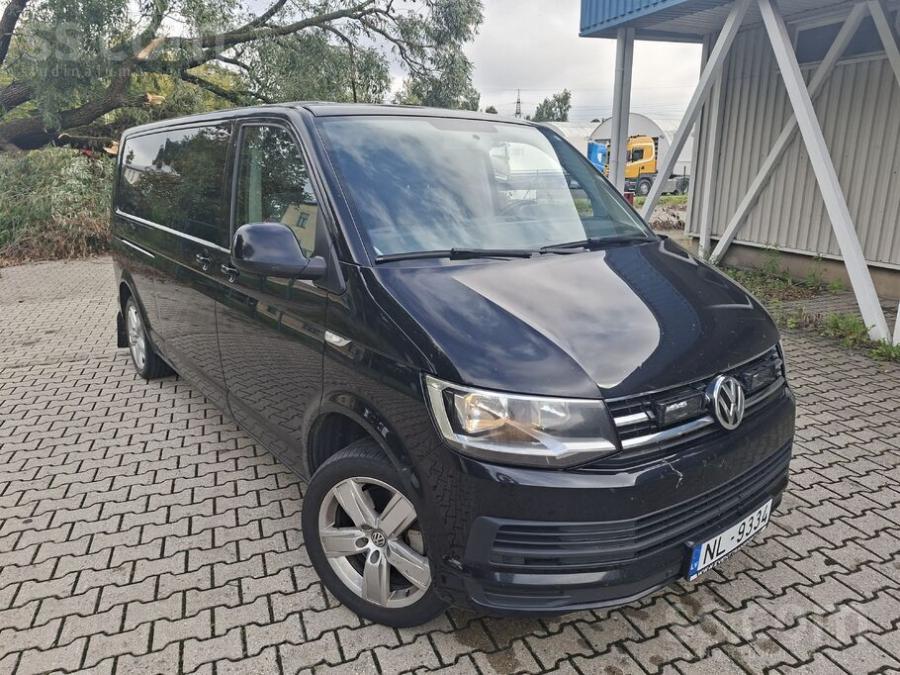 Black Volkswagen Caravelle 2017 in Riga, with an engine capacity of 2.00 L and mileage of 412 thousand km for 20570 €, photo 1 on AUTOMOTO.COM.LV