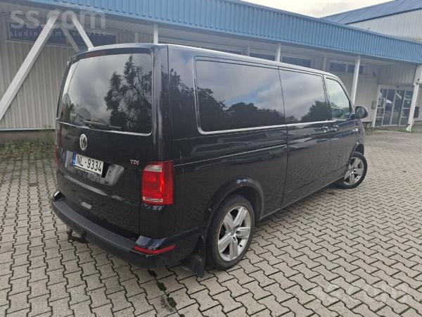 Black Volkswagen Caravelle 2017 in Riga, with an engine capacity of 2.00 L and mileage of 412 thousand km for 20570 €, photo 5 on AUTOMOTO.COM.LV
