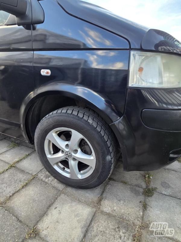 Black Volkswagen Caravelle 2007 in Siauliai, with an engine capacity of 2.50 L and mileage of 400 thousand km for 2990 €, photo 9 on AUTOMOTO.COM.LV