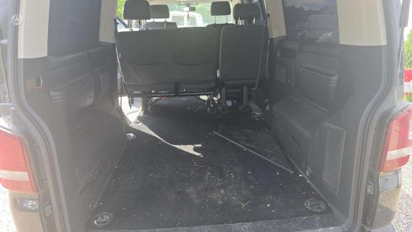 Black Volkswagen Caravelle 2010 in Klaipeda, with an engine capacity of 1.97 L and mileage of 310 thousand km for 7500 €, photo 5 on AUTOMOTO.COM.LV