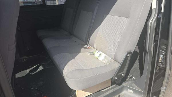 Black Volkswagen Caravelle 2010 in Klaipeda, with an engine capacity of 1.97 L and mileage of 310 thousand km for 7500 €, photo 6 on AUTOMOTO.COM.LV