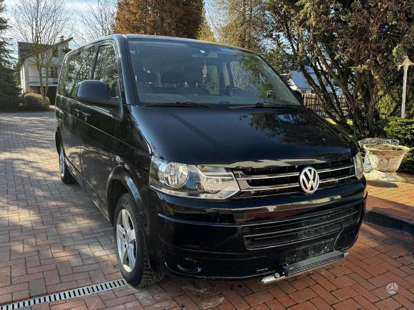Black Volkswagen Caravelle 2010 in Panevezys, with an engine capacity of 1.97 L and mileage of 270 thousand km for 8600 €, photo 1 on AUTOMOTO.COM.LV