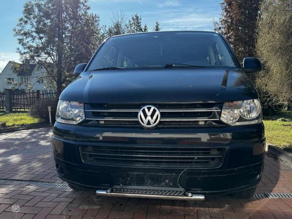 Black Volkswagen Caravelle 2010 in Panevezys, with an engine capacity of 1.97 L and mileage of 270 thousand km for 8600 €, photo 2 on AUTOMOTO.COM.LV
