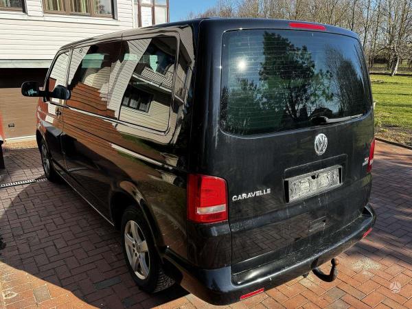 Melns Volkswagen Caravelle 2010 Panevēža, ar dzinēja tilpumu 1.97 L un nobraukumu 270 tūkst. km par 8600 €, foto 5 vietnē AUTOMOTO.COM.LV