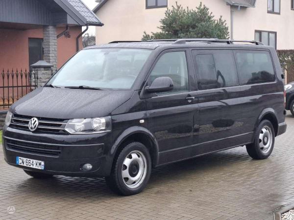 Black Volkswagen Caravelle 2012 in Taurage, with an engine capacity of 2.00 L and mileage of 233 thousand km for 14600 €, photo 1 on AUTOMOTO.COM.LV