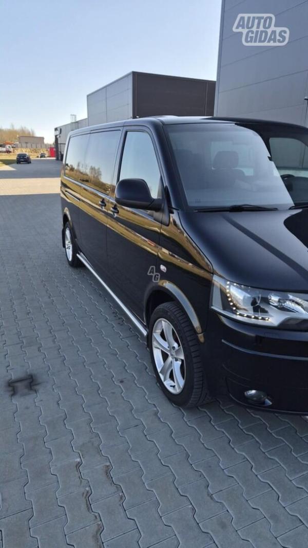 Black Volkswagen Caravelle 2012 in Siauliai, with an engine capacity of 2.00 L and mileage of 266 thousand km for 12900 €, photo 2 on AUTOMOTO.COM.LV