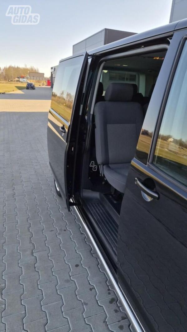 Black Volkswagen Caravelle 2012 in Siauliai, with an engine capacity of 2.00 L and mileage of 266 thousand km for 12900 €, photo 5 on AUTOMOTO.COM.LV