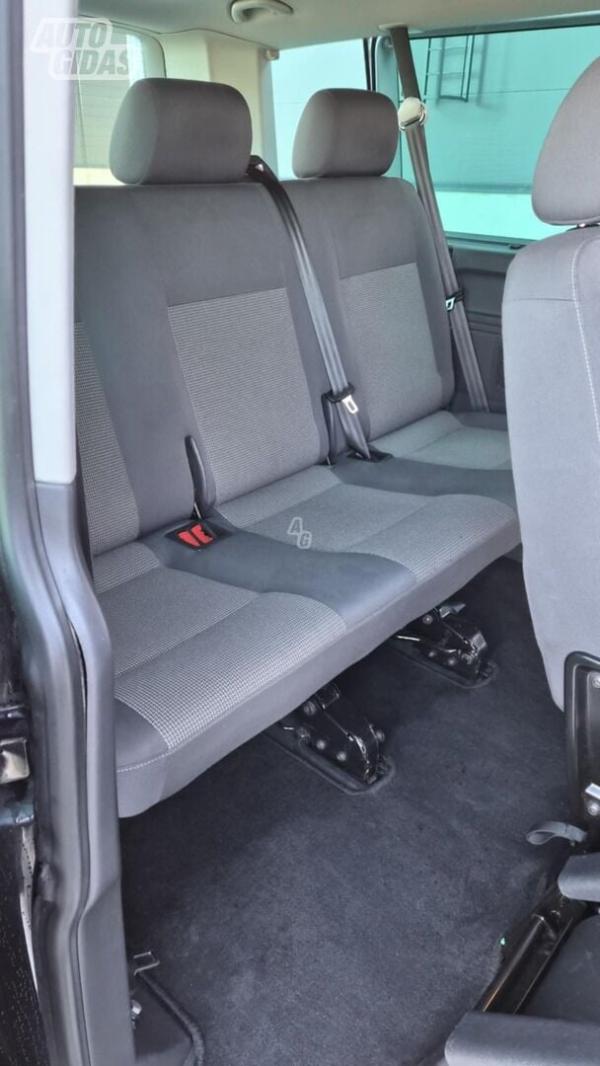 Black Volkswagen Caravelle 2012 in Siauliai, with an engine capacity of 2.00 L and mileage of 266 thousand km for 12900 €, photo 10 on AUTOMOTO.COM.LV