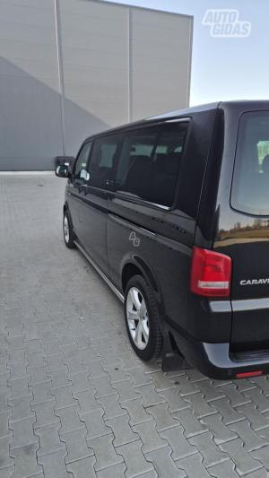 Melns Volkswagen Caravelle 2012 Šauļi, ar dzinēja tilpumu 2.00 L un nobraukumu 266 tūkst. km par 12900 €, foto 13 vietnē AUTOMOTO.COM.LV