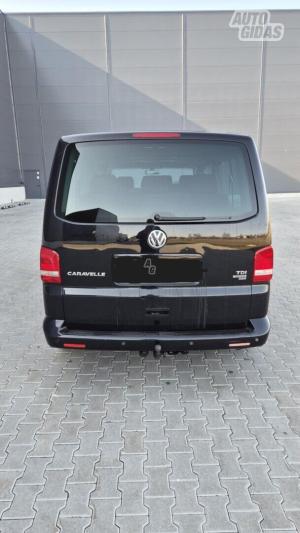 Melns Volkswagen Caravelle 2012 Šauļi, ar dzinēja tilpumu 2.00 L un nobraukumu 266 tūkst. km par 12900 €, foto 16 vietnē AUTOMOTO.COM.LV