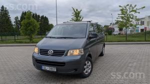 Zils Volkswagen Caravelle 2006 Rīga, ar dzinēja tilpumu 2.50 L un nobraukumu 360 tūkst. km par 4850 €, foto  vietnē AUTOMOTO.COM.LV