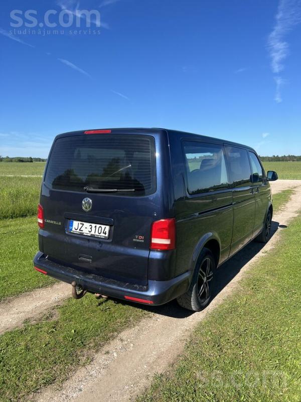 Blue Volkswagen Caravelle 2015 in Ventspils, with an engine capacity of 2.00 L and mileage of 324 thousand km for 8000 €, photo 4 on AUTOMOTO.COM.LV