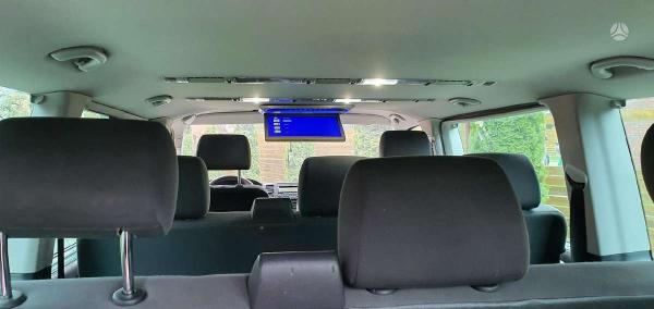 Brūns Volkswagen Caravelle 2010 Šauļi, ar dzinēja tilpumu 1.97 L un nobraukumu 394 tūkst. km par 7500 €, foto 2 vietnē AUTOMOTO.COM.LV