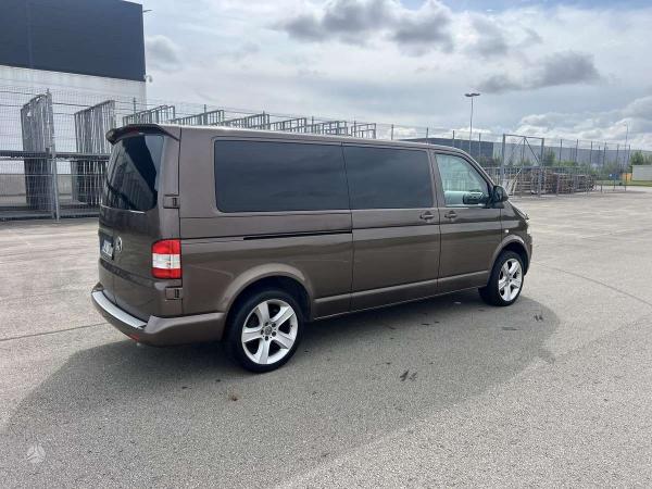 Brown Volkswagen Caravelle 2010 in Panevezys, with an engine capacity of 1.97 L and mileage of 403 thousand km for 11300 €, photo 4 on AUTOMOTO.COM.LV