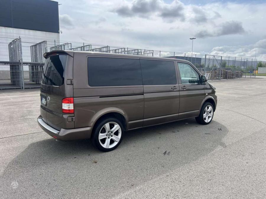 Brown Volkswagen Caravelle 2010 in Panevezys, with an engine capacity of 1.97 L and mileage of 403 thousand km for 11300 €, photo 4 on AUTOMOTO.COM.LV