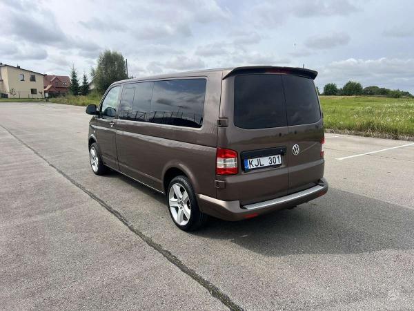 Brown Volkswagen Caravelle 2010 in Panevezys, with an engine capacity of 1.97 L and mileage of 403 thousand km for 11300 €, photo 5 on AUTOMOTO.COM.LV