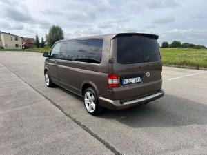 Brown Volkswagen Caravelle 2010 in Panevezys, with an engine capacity of 1.97 L and mileage of 403 thousand km for 11300 €, photo 5 on AUTOMOTO.COM.LV