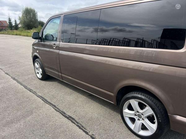 Brown Volkswagen Caravelle 2010 in Panevezys, with an engine capacity of 1.97 L and mileage of 403 thousand km for 11300 €, photo 6 on AUTOMOTO.COM.LV