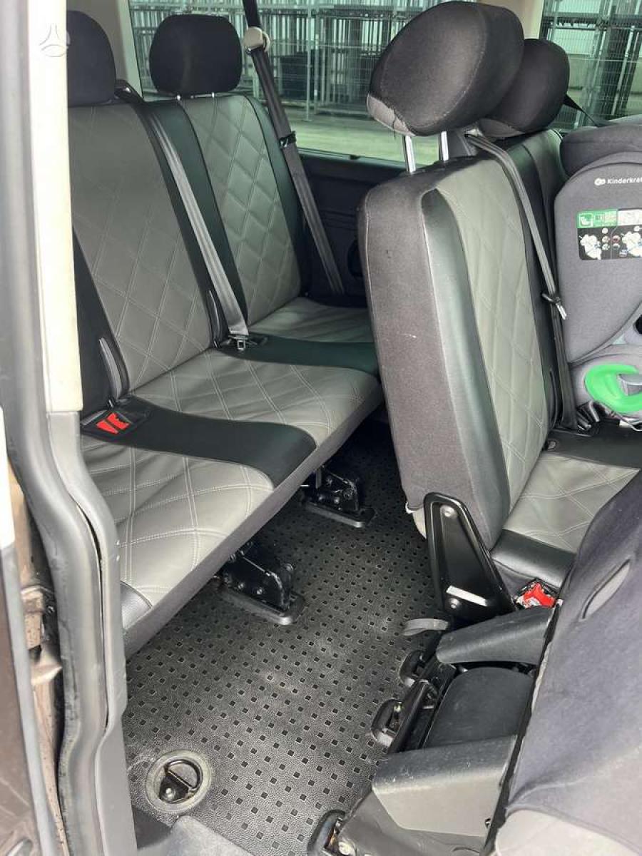 Brown Volkswagen Caravelle 2010 in Panevezys, with an engine capacity of 1.97 L and mileage of 403 thousand km for 11300 €, photo 10 on AUTOMOTO.COM.LV