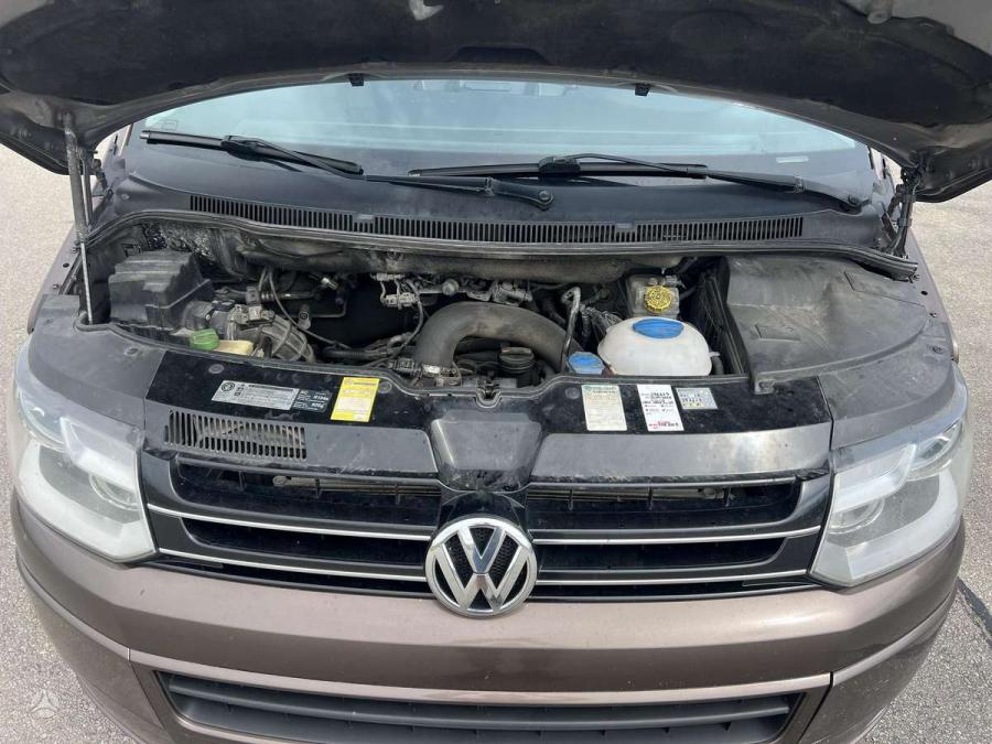 Brown Volkswagen Caravelle 2010 in Panevezys, with an engine capacity of 1.97 L and mileage of 403 thousand km for 11300 €, photo 14 on AUTOMOTO.COM.LV