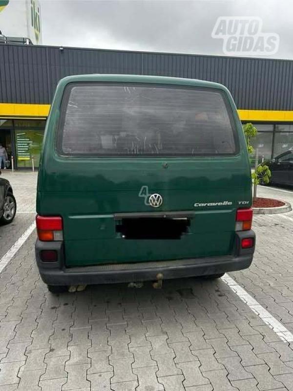 Green Volkswagen Caravelle 1997 in Panevezys, with an engine capacity of 2.50 L and mileage of 396 thousand km for 2000 €, photo 5 on AUTOMOTO.COM.LV