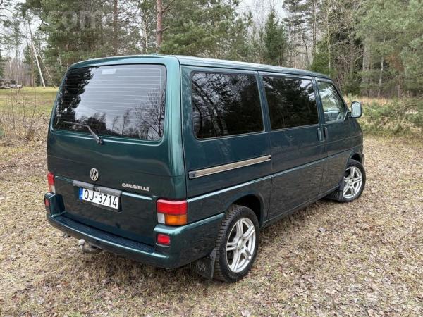 Zaļš Volkswagen Caravelle 2003 Tukums, ar dzinēja tilpumu 2.50 L un nobraukumu 298 tūkst. km par 6300 €, foto 2 vietnē AUTOMOTO.COM.LV