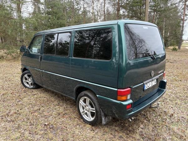 Zaļš Volkswagen Caravelle 2003 Tukums, ar dzinēja tilpumu 2.50 L un nobraukumu 298 tūkst. km par 6300 €, foto 6 vietnē AUTOMOTO.COM.LV