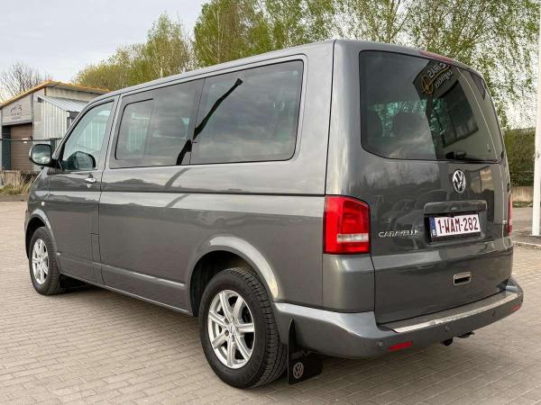 Grey Volkswagen Caravelle 2012 in Utena, with an engine capacity of 2.00 L and mileage of 298 thousand km for 12200 €, photo 4 on AUTOMOTO.COM.LV