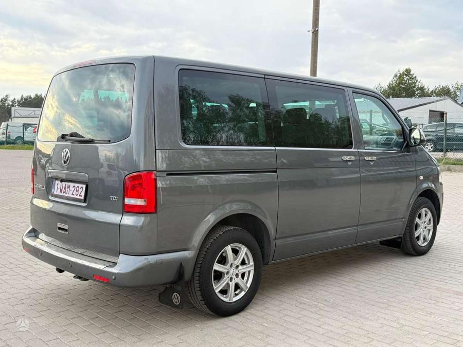 Grey Volkswagen Caravelle 2012 in Utena, with an engine capacity of 2.00 L and mileage of 298 thousand km for 12200 €, photo 6 on AUTOMOTO.COM.LV