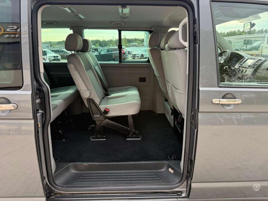 Grey Volkswagen Caravelle 2012 in Utena, with an engine capacity of 2.00 L and mileage of 298 thousand km for 12200 €, photo 23 on AUTOMOTO.COM.LV