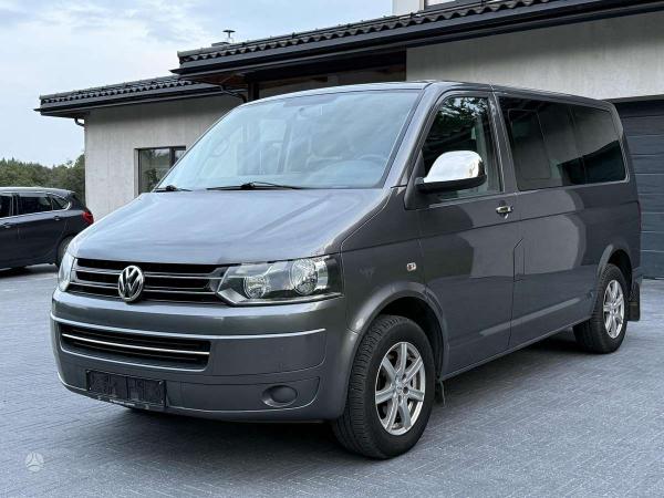 Grey Volkswagen Caravelle 2012 in Utena, with an engine capacity of 2.00 L and mileage of 290 thousand km for 11990 €, photo 1 on AUTOMOTO.COM.LV