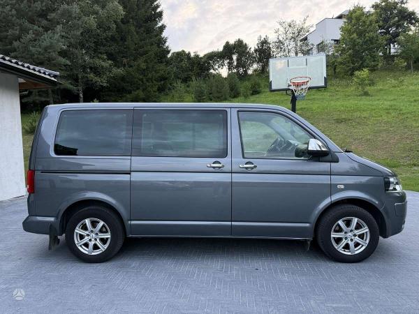 Grey Volkswagen Caravelle 2012 in Utena, with an engine capacity of 2.00 L and mileage of 290 thousand km for 11990 €, photo 3 on AUTOMOTO.COM.LV