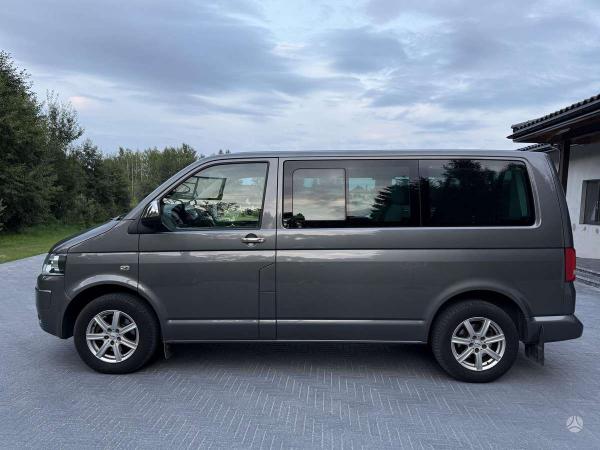 Grey Volkswagen Caravelle 2012 in Utena, with an engine capacity of 2.00 L and mileage of 290 thousand km for 11990 €, photo 6 on AUTOMOTO.COM.LV