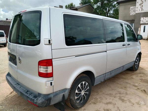 Grey Volkswagen Caravelle 2015 in Plunge, with an engine capacity of 2.00 L and mileage of 274 thousand km for 8900 €, photo 2 on AUTOMOTO.COM.LV