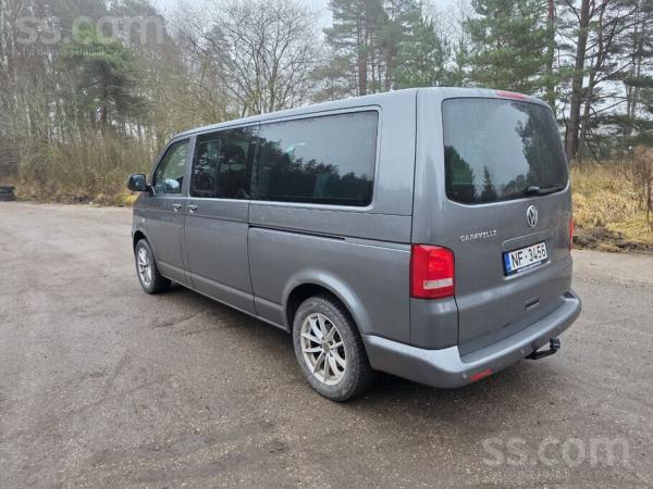 Grey Volkswagen Caravelle 2010 in Riga, with an engine capacity of 2.00 L and mileage of 214 thousand km for 13500 €, photo 1 on AUTOMOTO.COM.LV