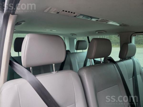 Grey Volkswagen Caravelle 2010 in Riga, with an engine capacity of 2.00 L and mileage of 214 thousand km for 13500 €, photo 8 on AUTOMOTO.COM.LV