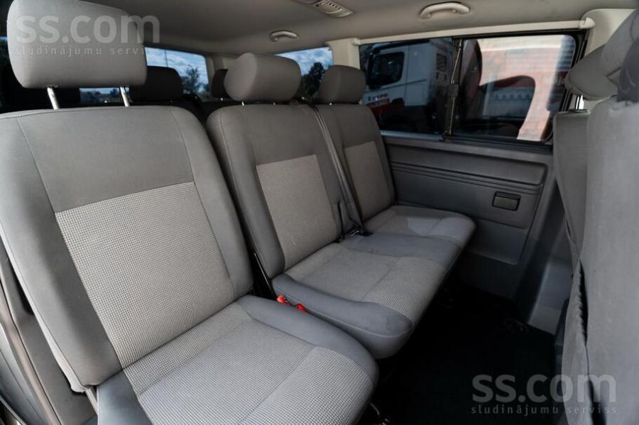Grey Volkswagen Caravelle 2010 in Riga, with an engine capacity of 2.00 L and mileage of 260 thousand km for 11000 €, photo 14 on AUTOMOTO.COM.LV