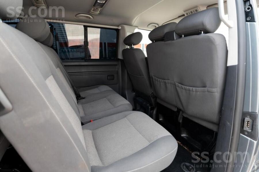 Grey Volkswagen Caravelle 2010 in Riga, with an engine capacity of 2.00 L and mileage of 260 thousand km for 11000 €, photo 23 on AUTOMOTO.COM.LV