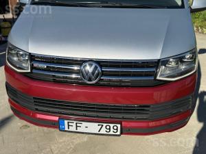 Grey Volkswagen Caravelle 2016 in Riga, with an engine capacity of 2.00 L and mileage of 252 thousand km for 24400 €, photo 6 on AUTOMOTO.COM.LV