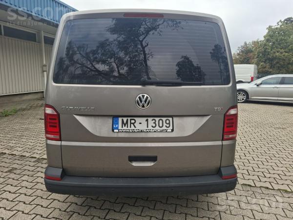 Grey Volkswagen Caravelle 2017 in Riga, with an engine capacity of 2.00 L and mileage of 460 thousand km for 18750 €, photo 8 on AUTOMOTO.COM.LV
